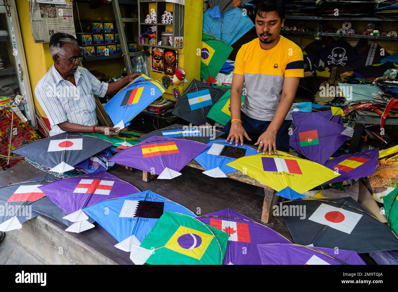 Indian kite-makers display kites with flags of different countries ...
