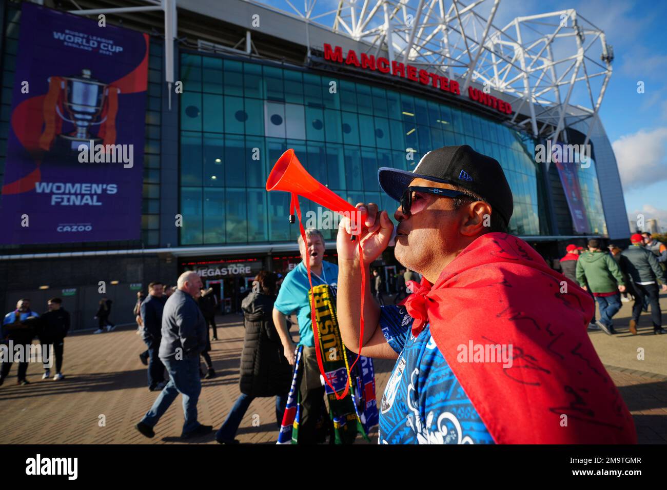 Carlos Asaia Brown, a Samoa fan, blows a horn ahead of the Rugby League ...