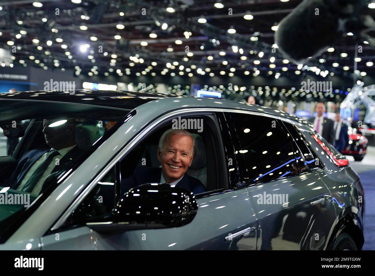 FILE - President Joe Biden drives a Cadillac Lyriq through the showroom ...