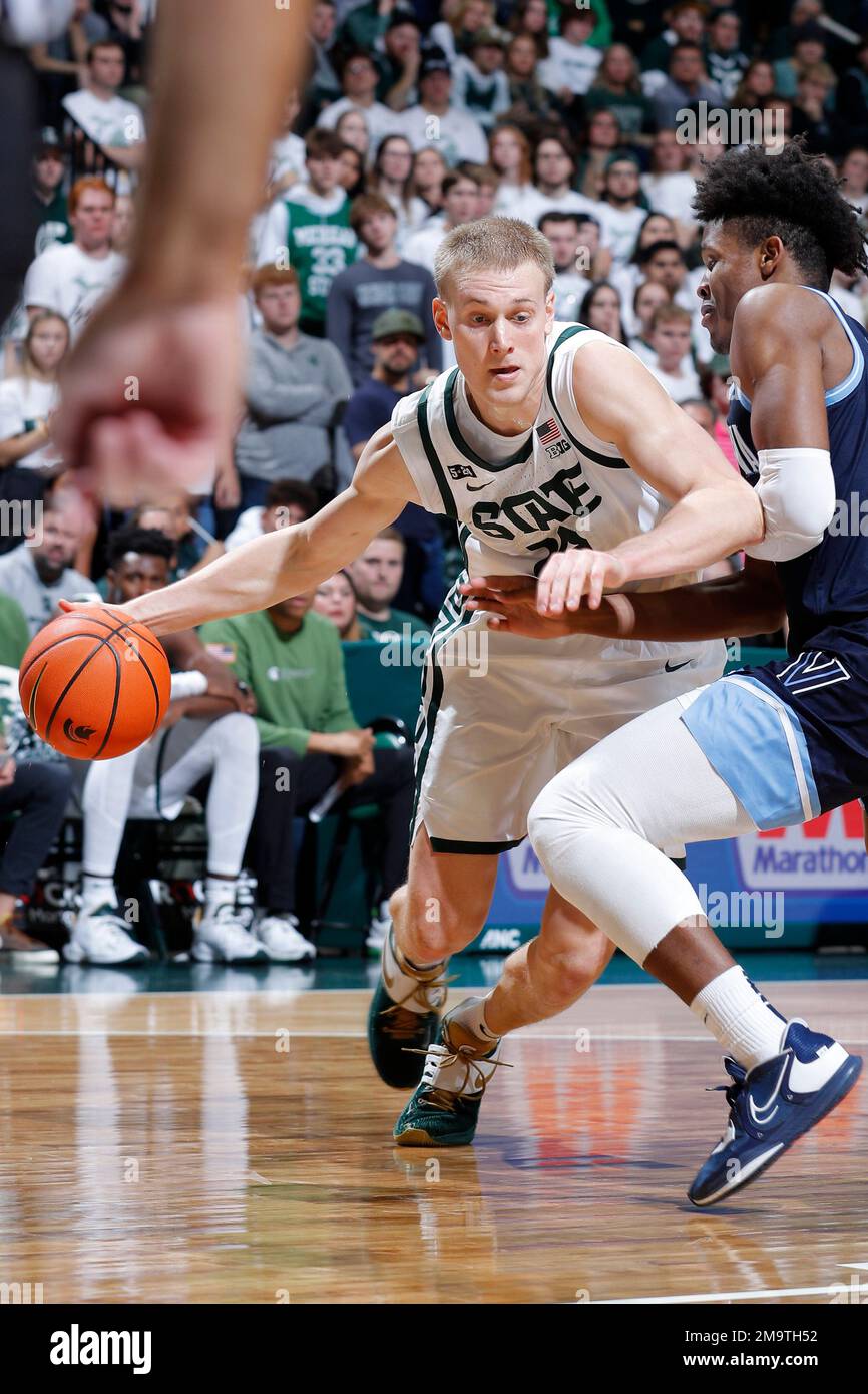 Michigan State's Joey Hauser, left, drives against Villanova's Jordan ...
