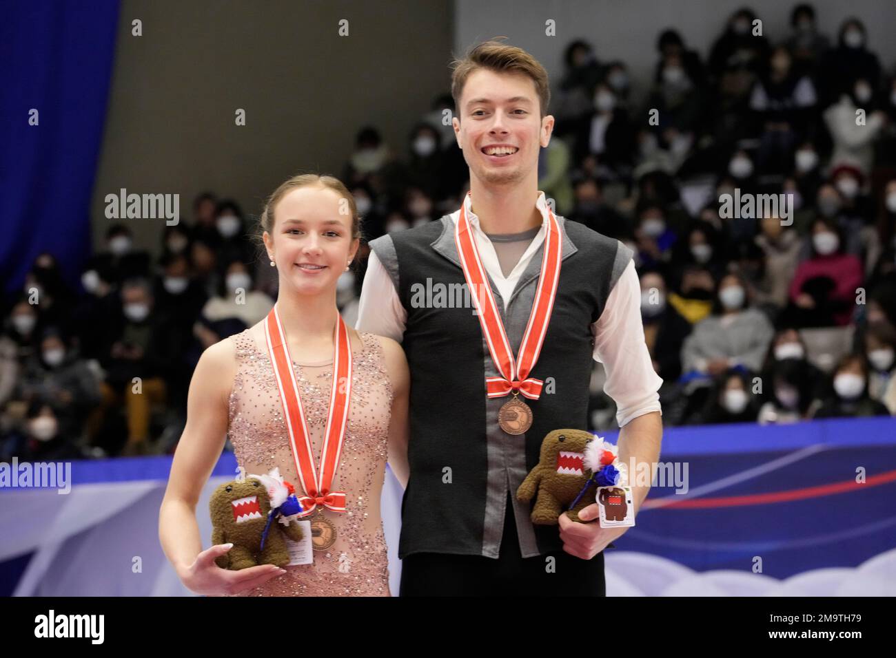 Brooke Mcintosh and Benjamin Mimar of Canada pose for a photo as they ...