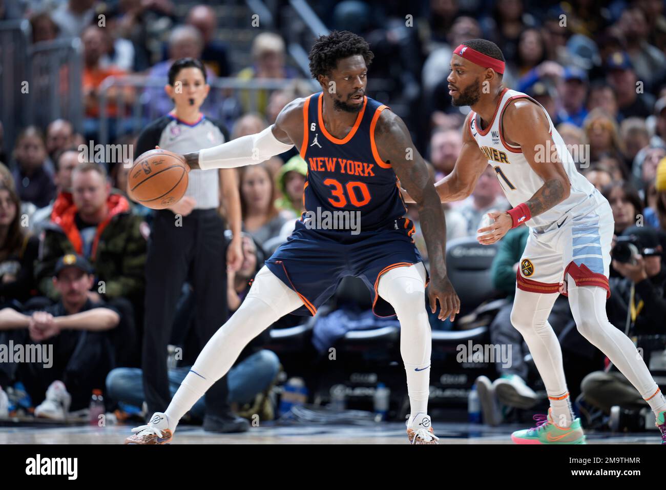New York Knicks forward Julius Randle (30) and Denver Nuggets forward ...