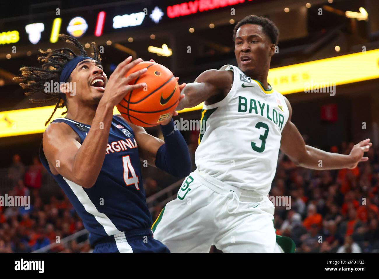 Baylor guard Dale Bonner (3) reaches out to block the shot of Virginia ...