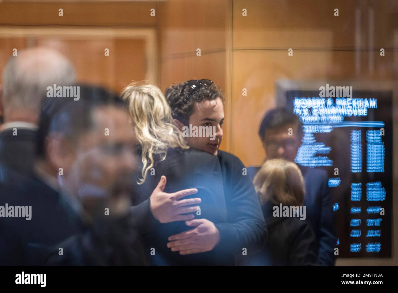 Theranos founder and CEO Elizabeth Holmes gets a hug from a supporter ...