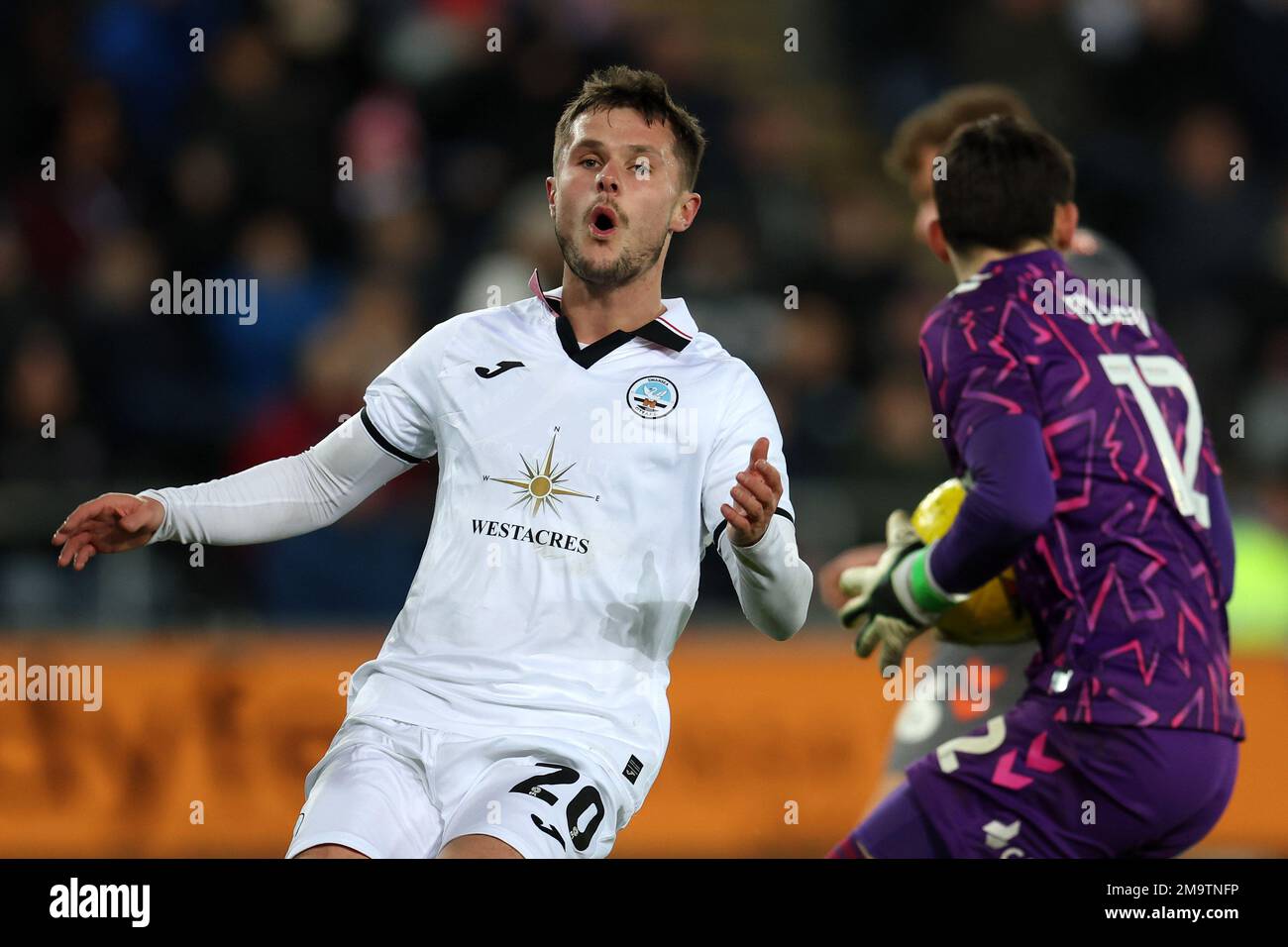 Swansea, UK. 17th Jan, 2023. Liam Cullen of Swansea City reacts ...