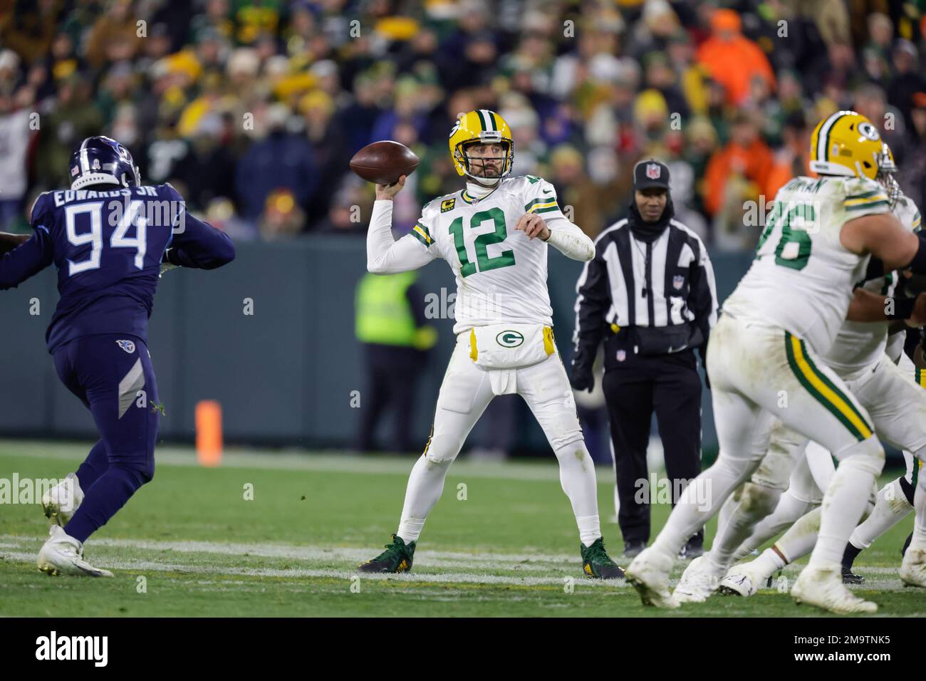 Green Bay Packers quarterback Aaron Rodgers (12) looks to pass against ...