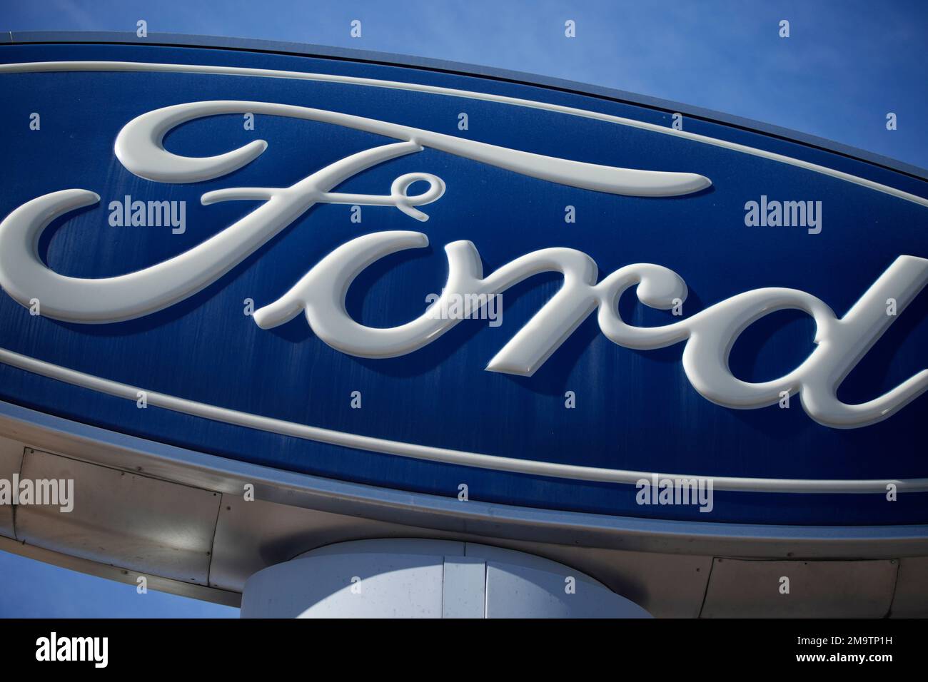 FILE - This Oct. 24, 2021 file photo shows a Ford company logo on a ...