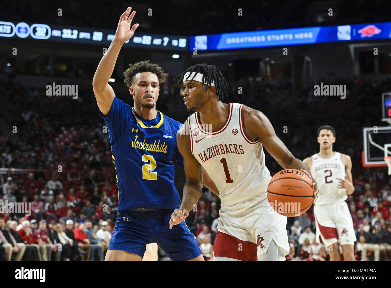 Arkansas guard Ricky Council IV (1) drives against South Dakota State ...