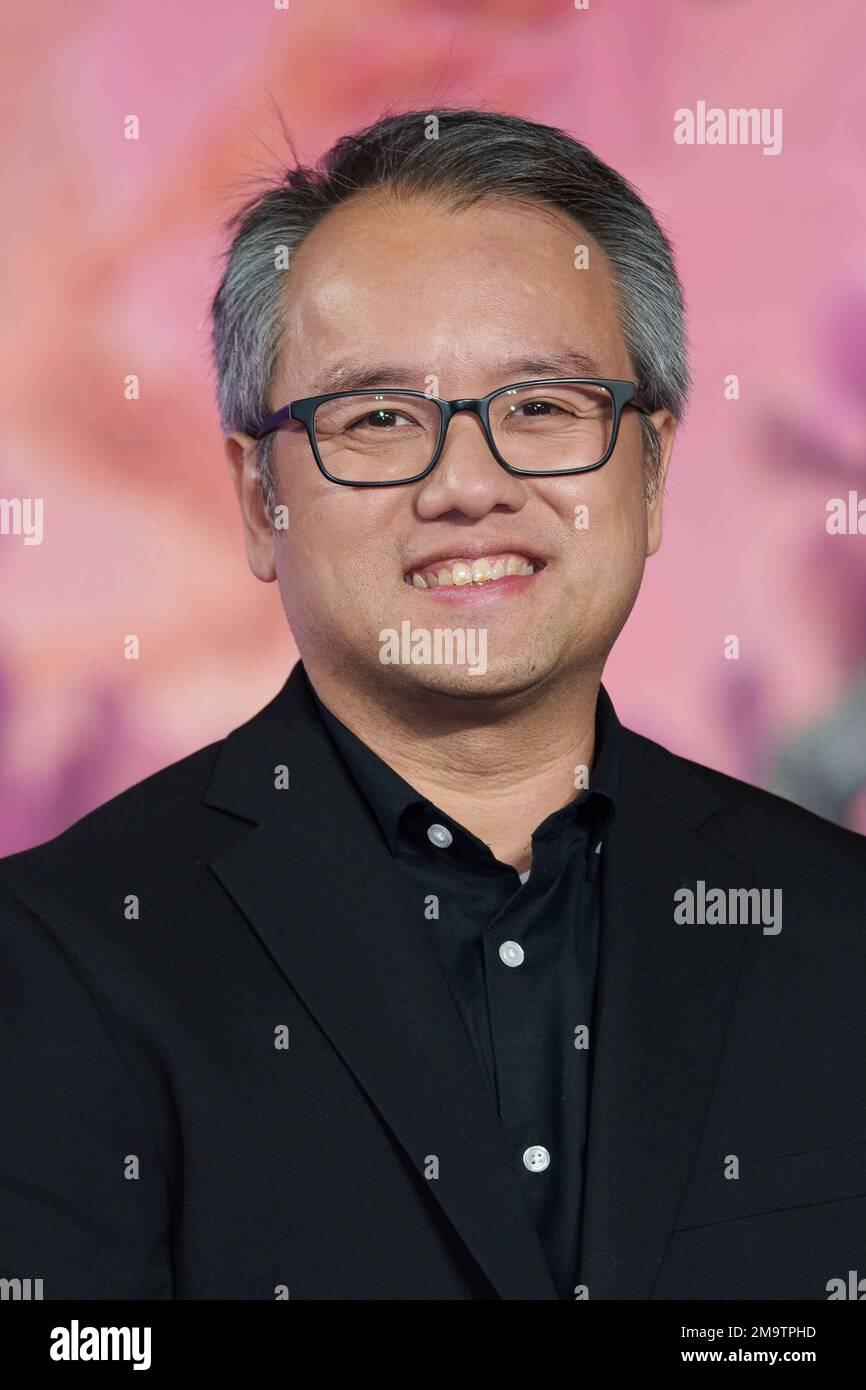 Qui Nguyen poses for photographers upon arrival at the premiere of the ...