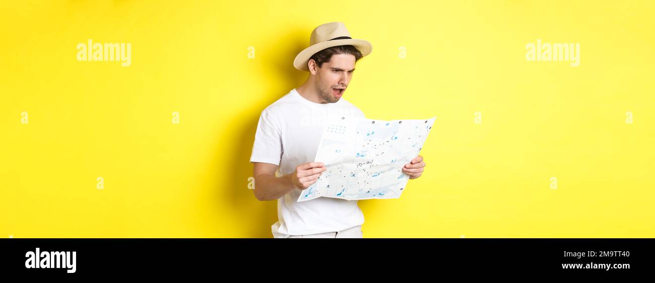 Travelling, vacation and tourism concept. Tourist looking displeased ...