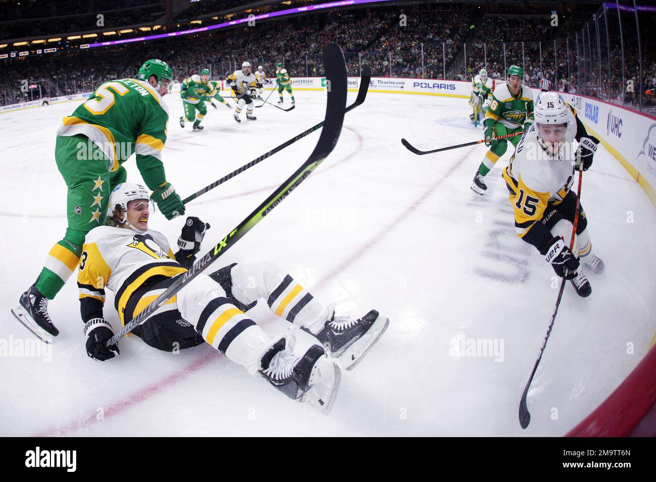 Pittsburgh Penguins right wing Josh Archibald (15) controls the puck as ...