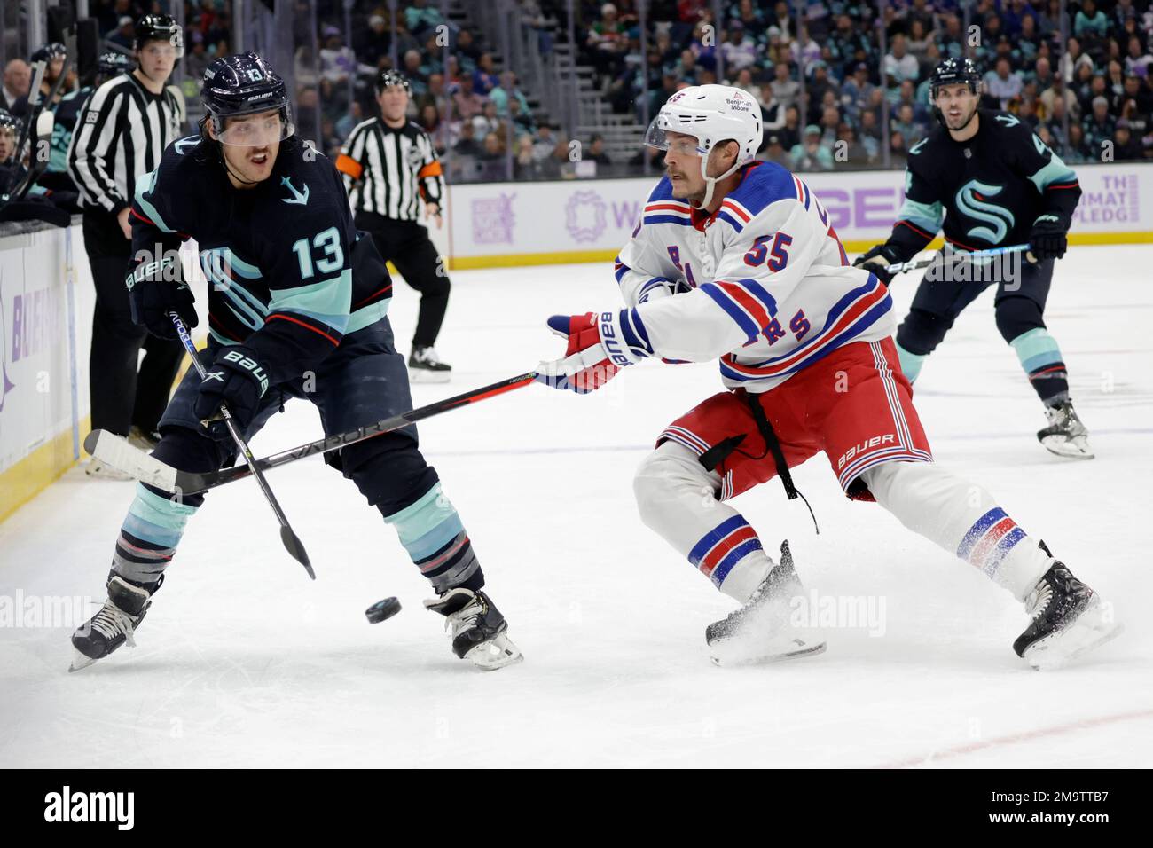 Seattle Kraken left wing Brandon Tanev (13) battles with New York ...