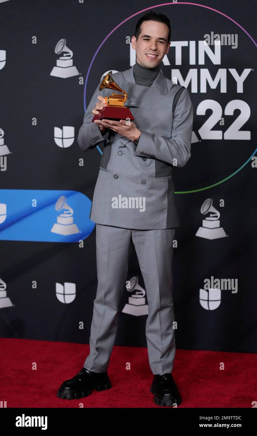 Edgar Barrera poses in the press room with the award for best regional ...