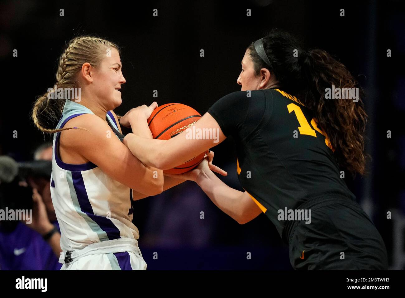 Kansas State guard Gabby Gregory, left, and Iowa forward McKenna ...