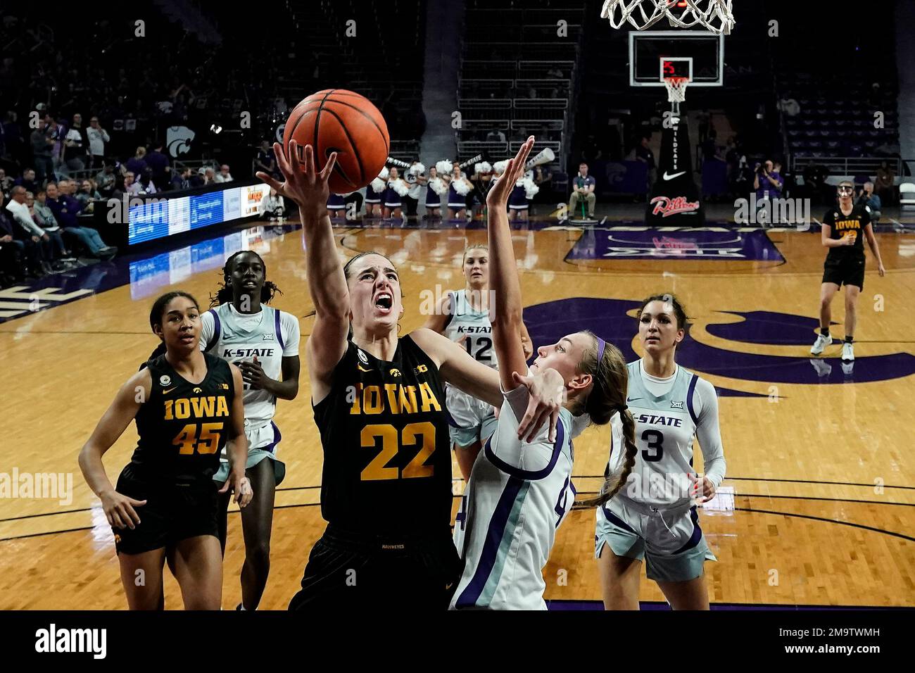 Iowa guard Caitlin Clark (22) gets past Kansas State guard Serena ...