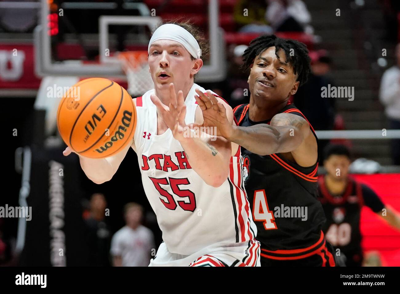 Sam Houston State guard Donte Powers, right, defends against Utah guard ...