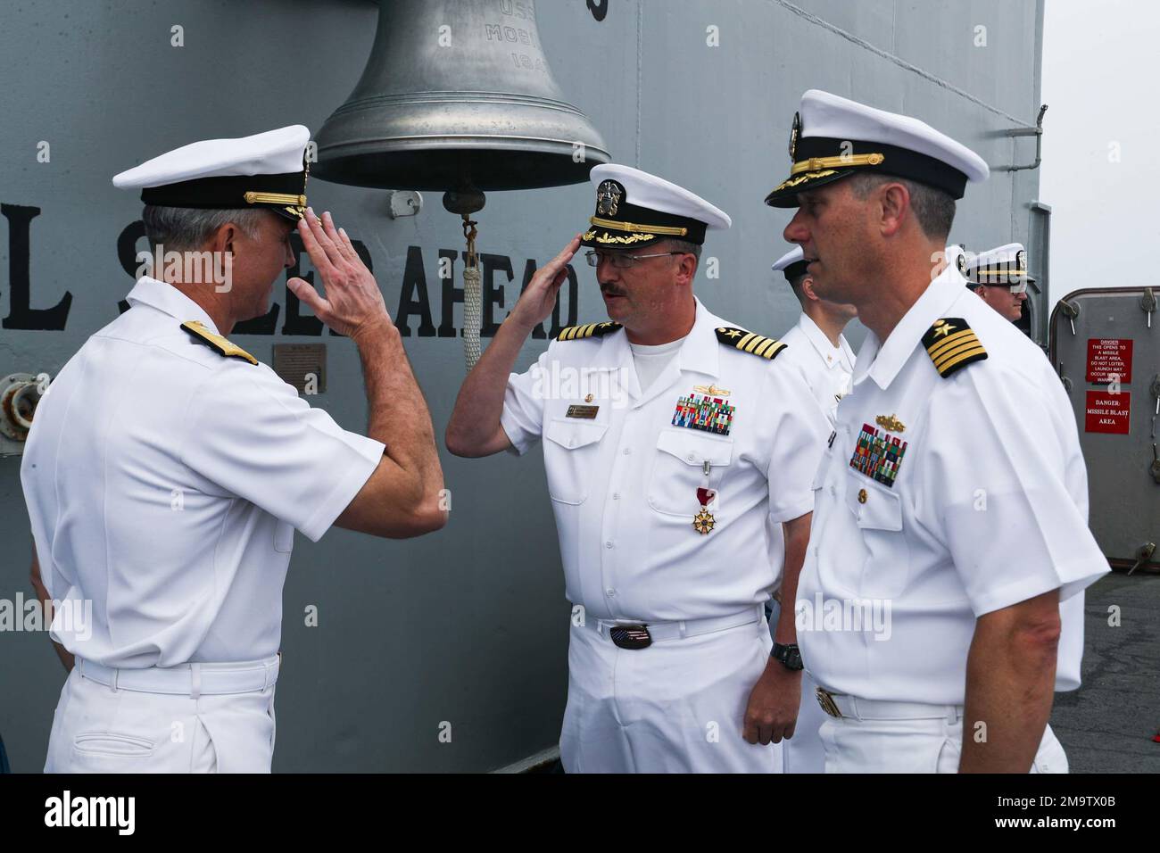 PHILIPPINE SEA (May 20, 2022) Rear Adm. J.T. Anderson, left, from Fayetteville, N.C., commander ...