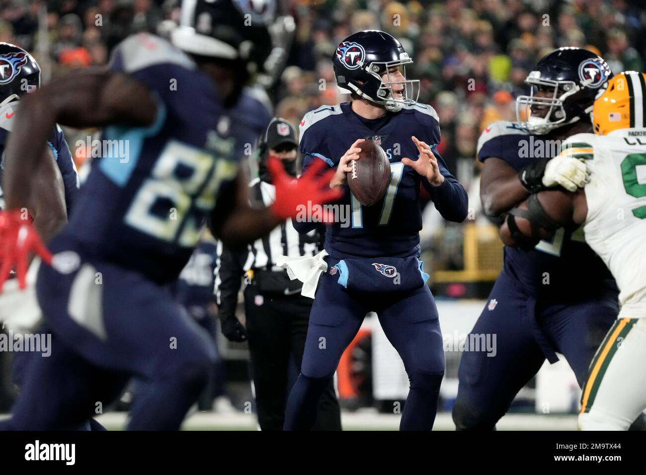 Tennessee Titans quarterback Ryan Tannehill, center, prepares to throw ...