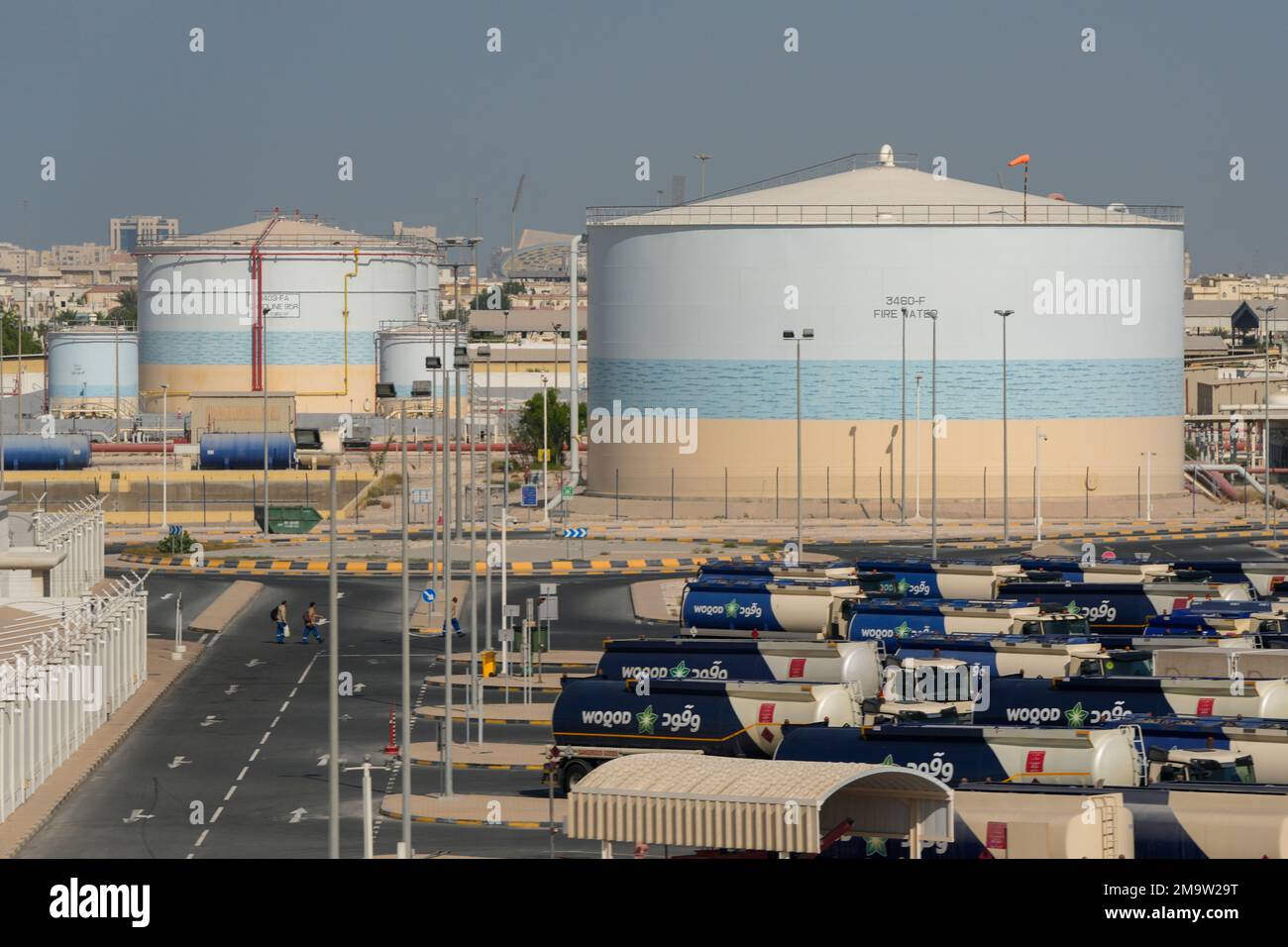 Fuel trucks line up in front of storage tanks in Doha, Qatar, Thursday, Nov. 17, 2022. (AP Photo ...