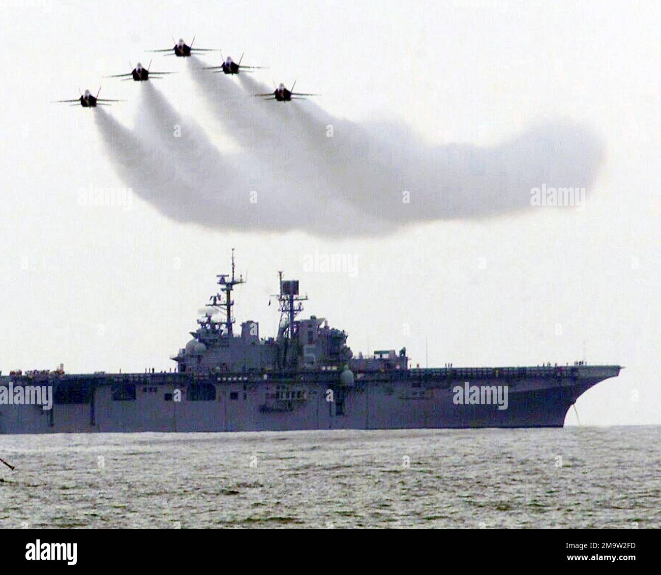 Five US Navy (USN) Blue Angles F/A-18C Hornet aerial demonstration team ...