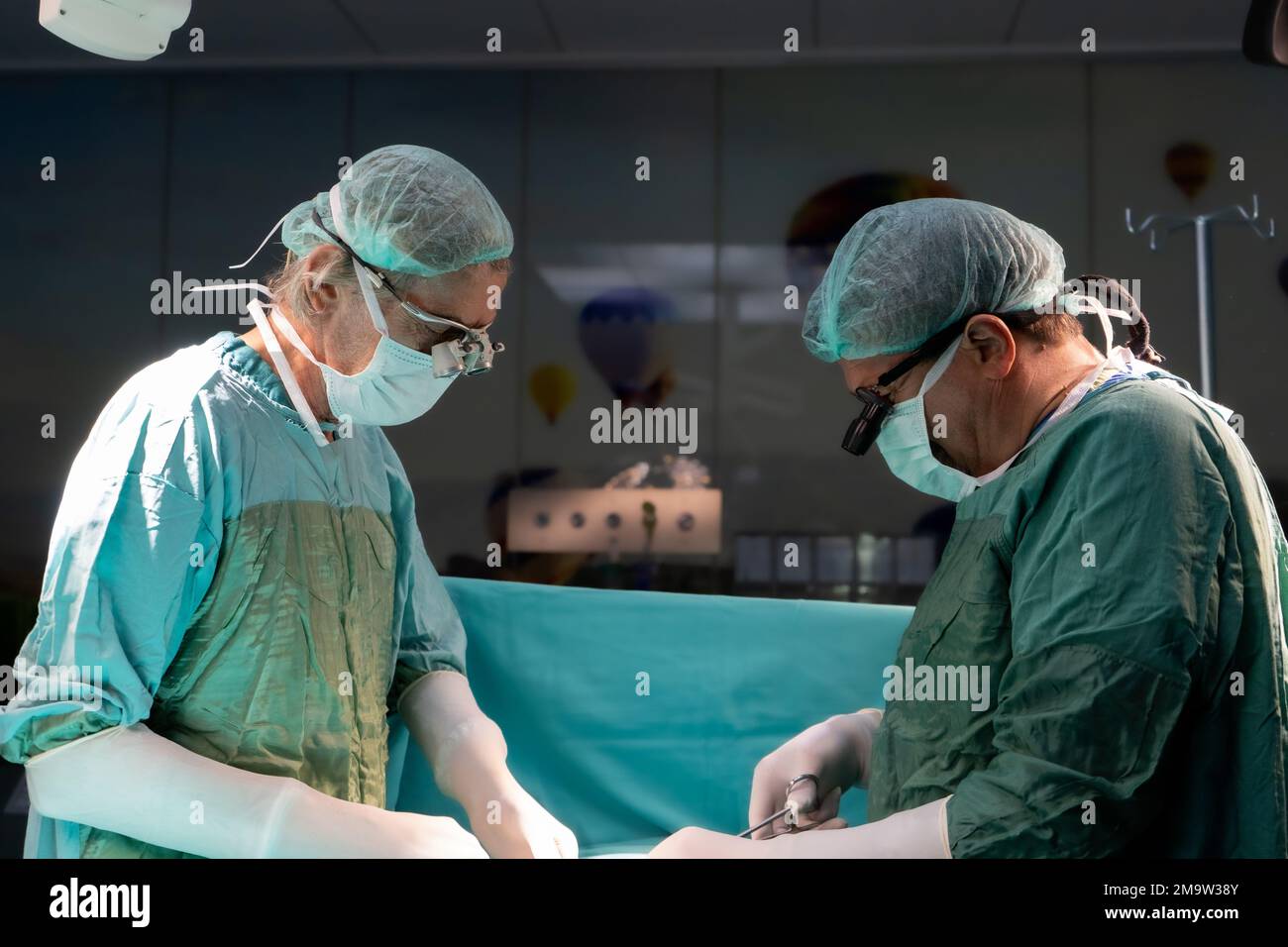 Open heart surgery doctor perform open heart surgery. Doctors in green ...