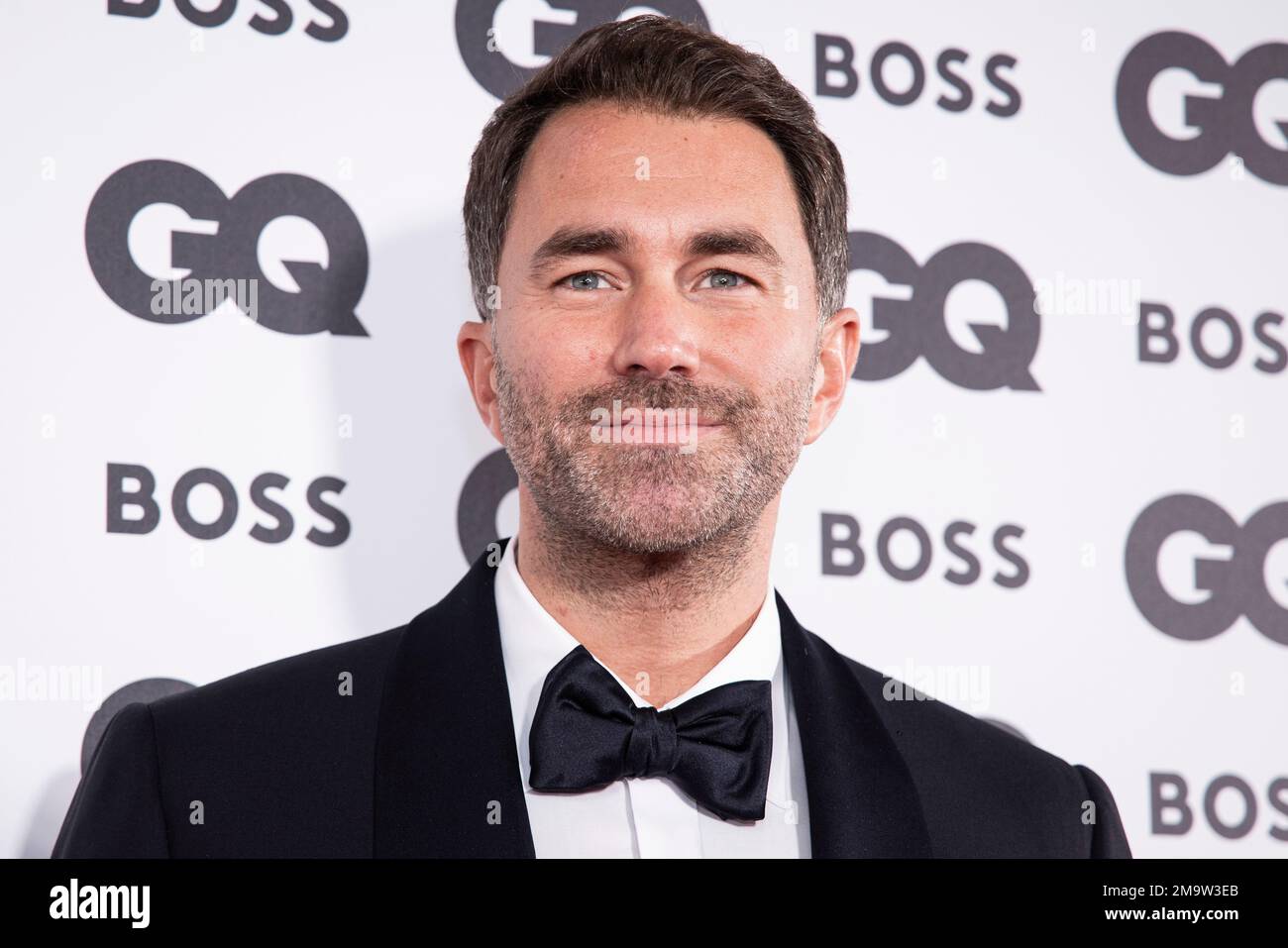 Eddie Hearn poses for photographers upon arrival at the GQ Men of the ...