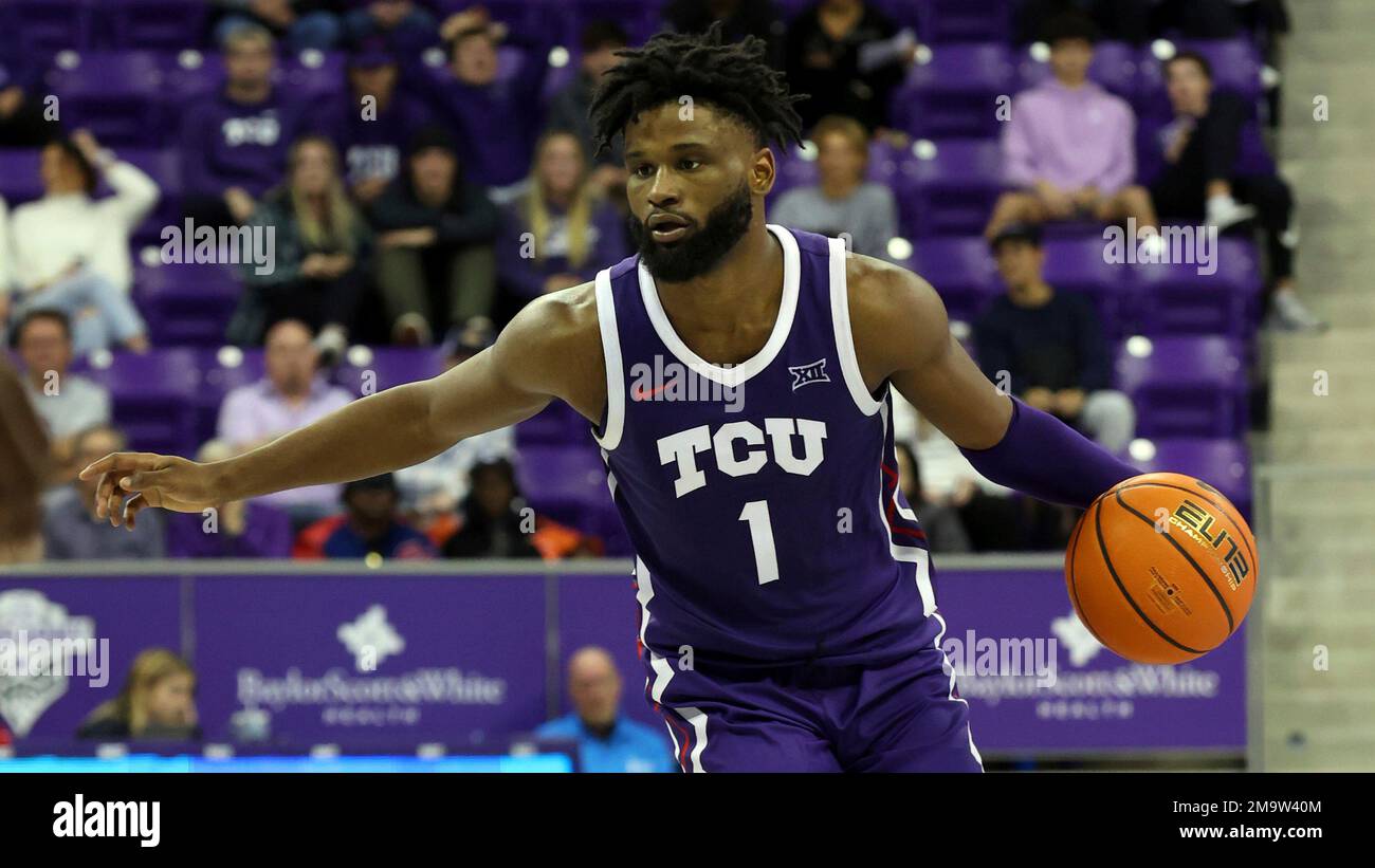TCU guard Mike Miles Jr. (1) dribbles the ball down the court against ...