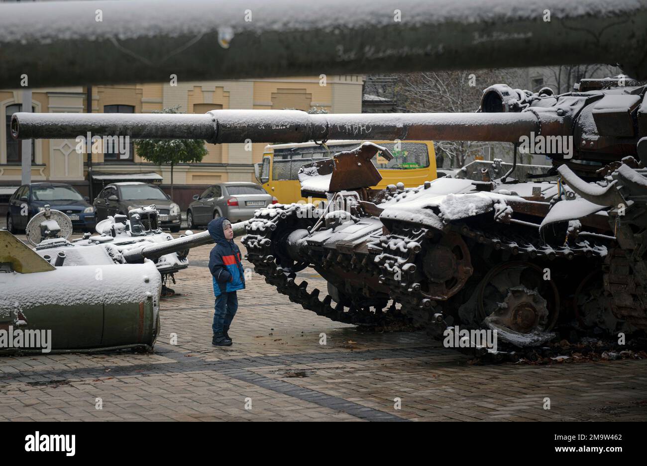 A child looks at a display of destroyed Russian tanks and armoured ...