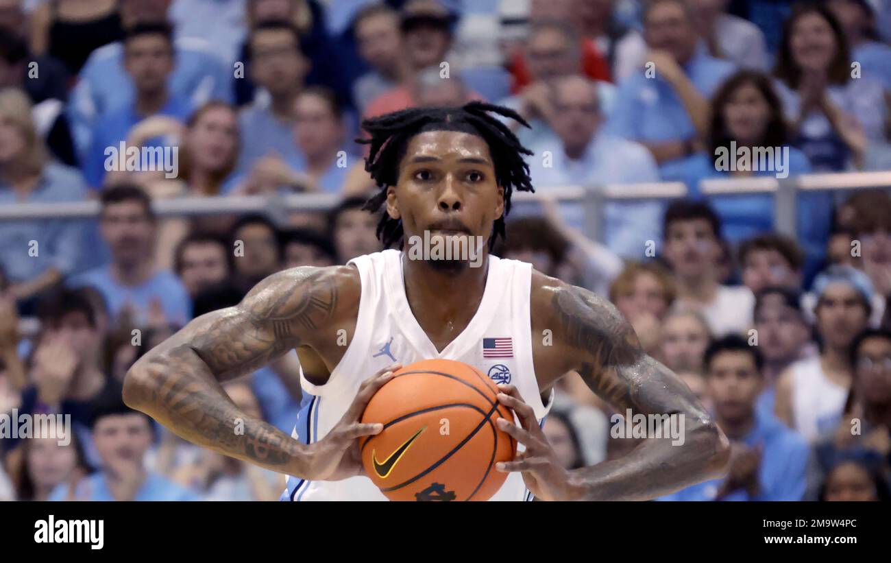 North Carolina guard Caleb Love (2) looks to pass as he brings the ball ...