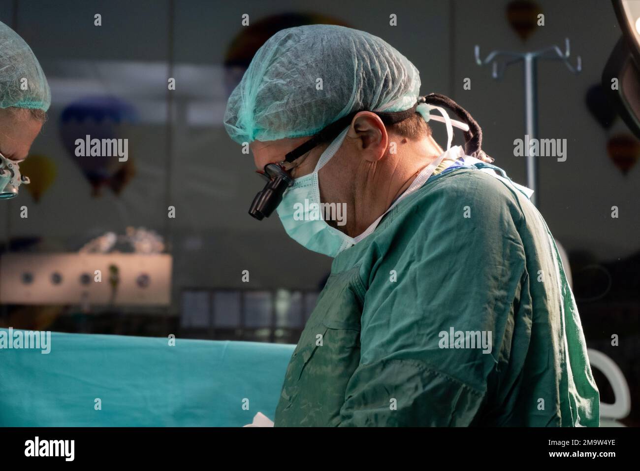 Open heart surgery doctor perform open heart surgery. Doctors in green ...