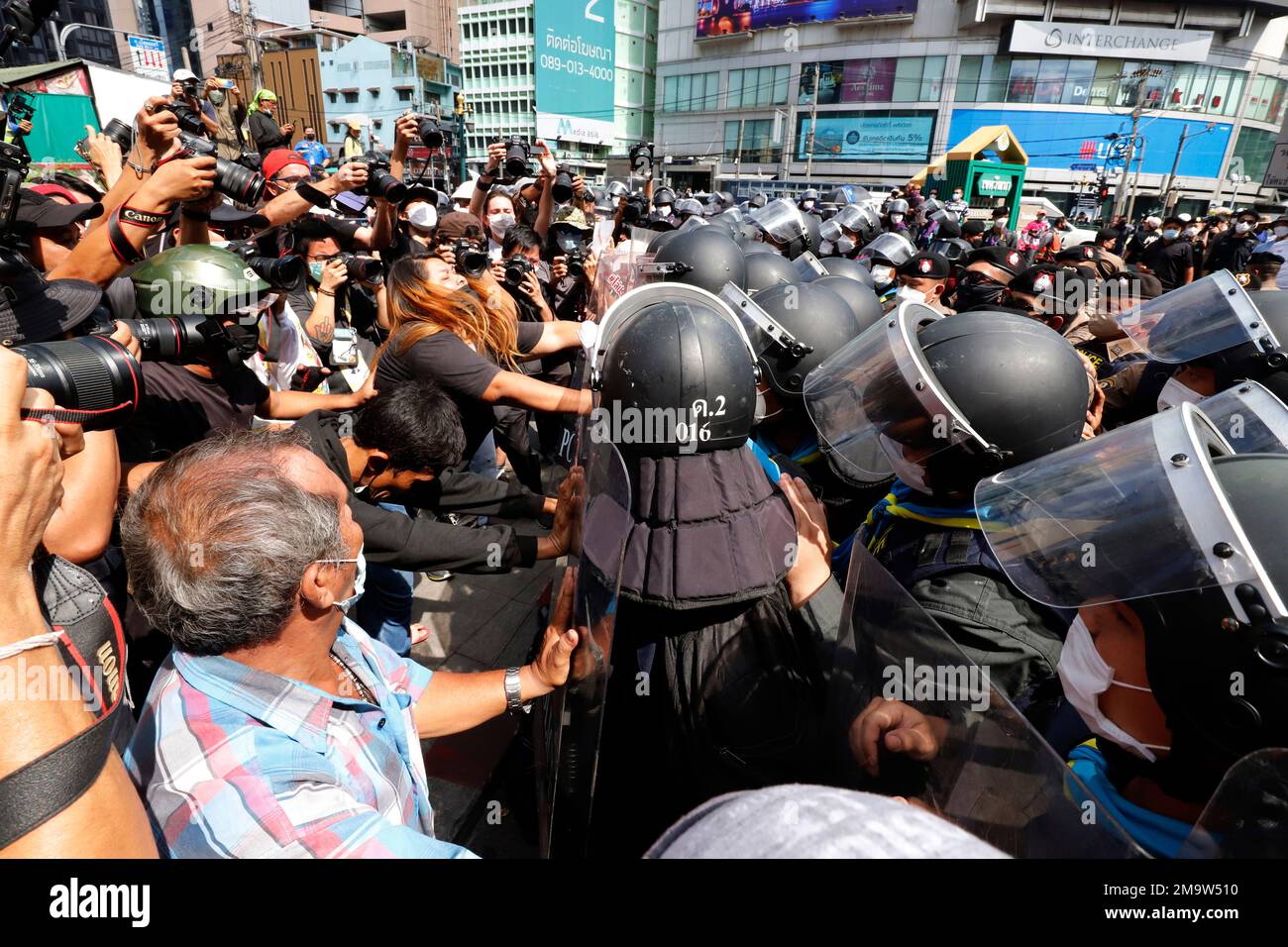 Protesters push police during a demonstration near the Asia-Pacific ...
