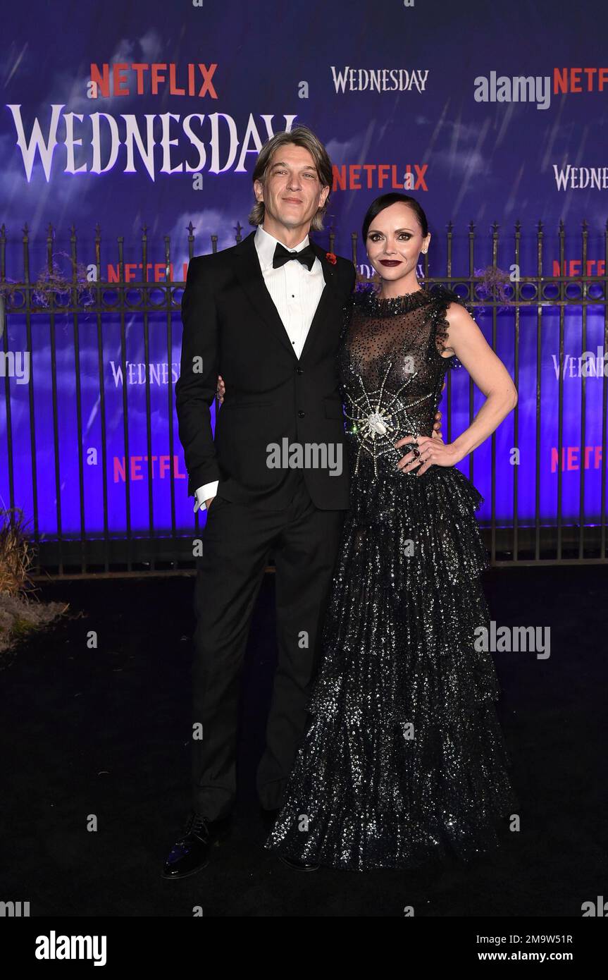 Mark Hampton,left, and Christina Ricci arrive at the premiere of ...