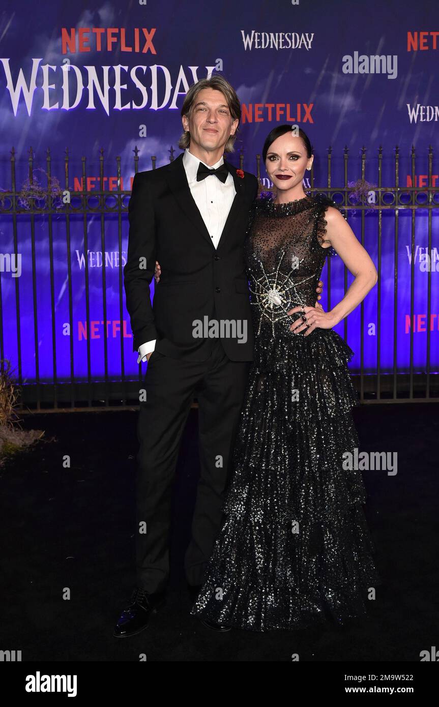 Mark Hampton,left, and Christina Ricci arrive at the premiere of ...
