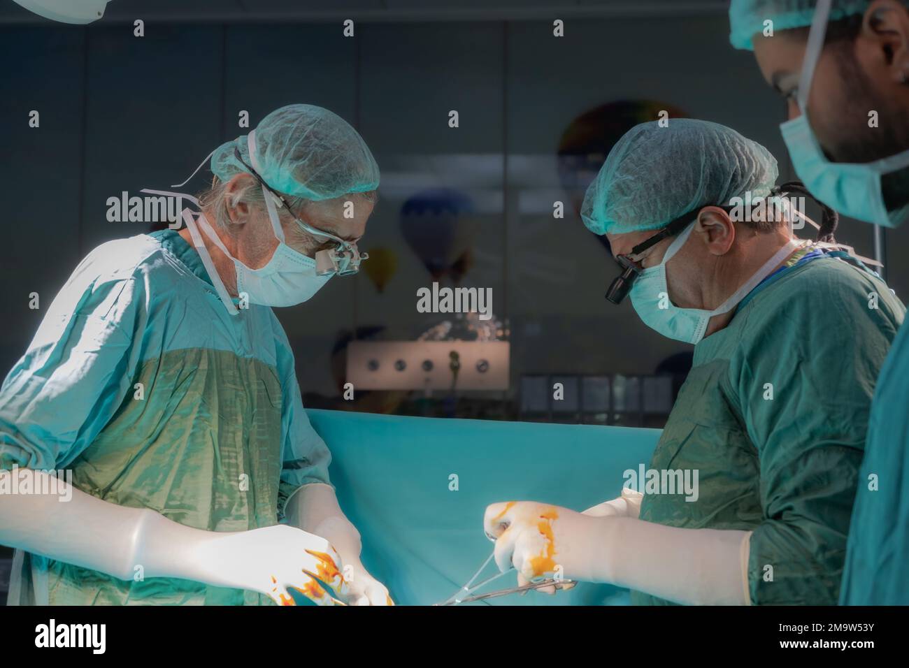 Open heart surgery doctor perform open heart surgery. Doctors in green ...
