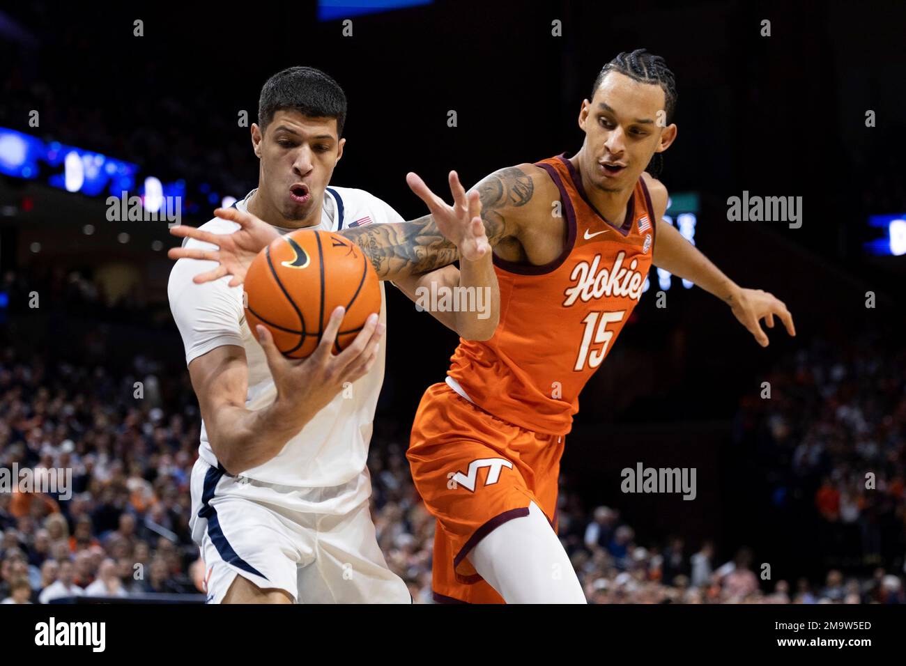 Virginia's Kadin Shedrick, left, and Virginia Tech's Lynn Kidd (15 ...