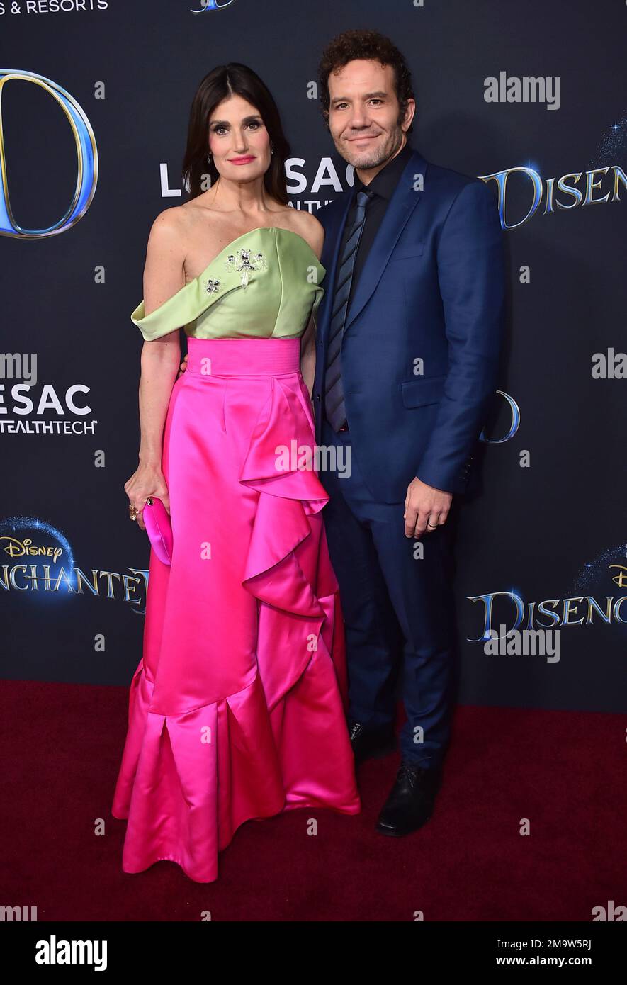 Idina Menzel, left, and Aaron Lohr arrive at the Los Angeles premiere ...