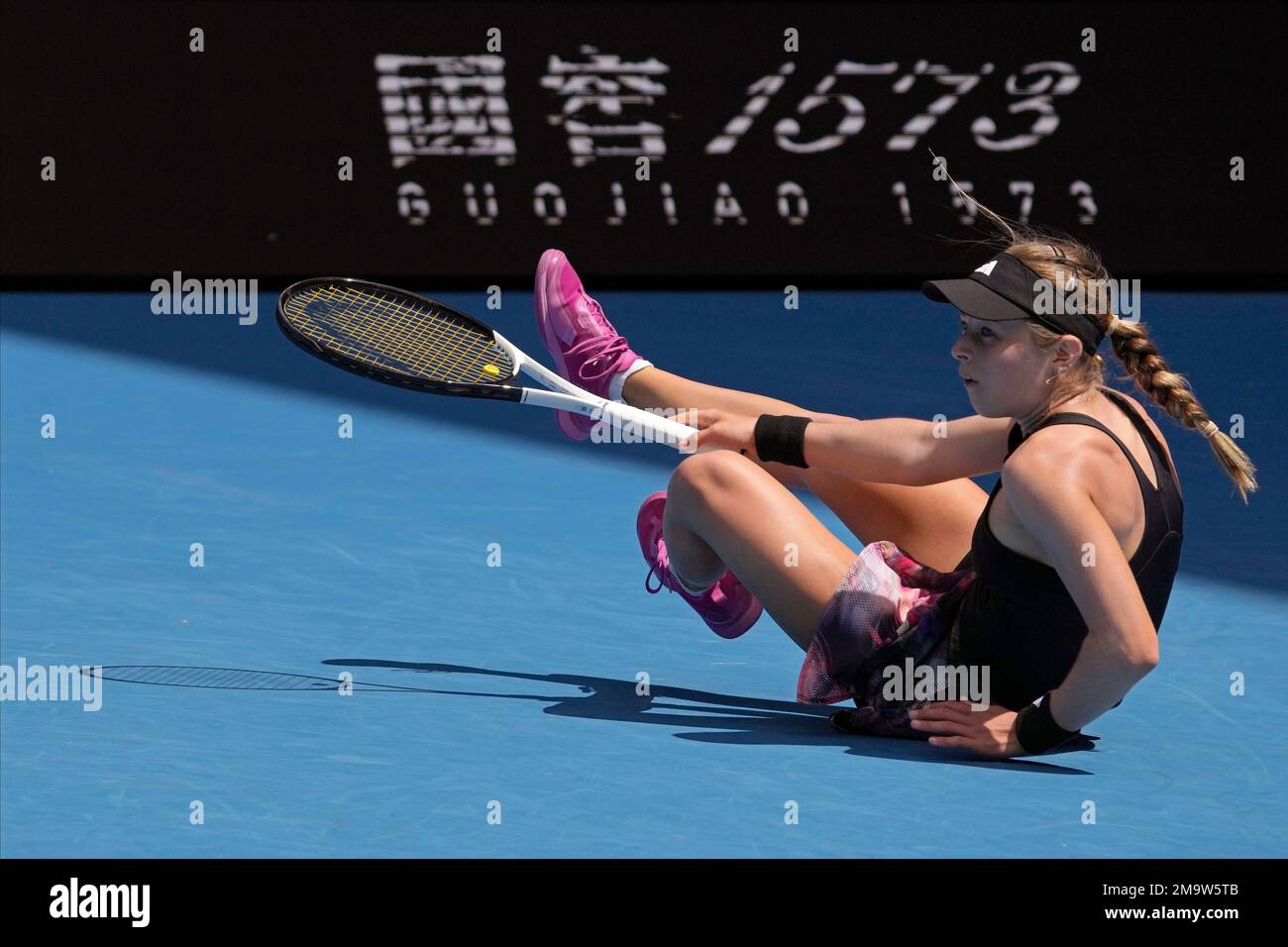 Katie Volynets of the U.S. falls during her second round match against ...