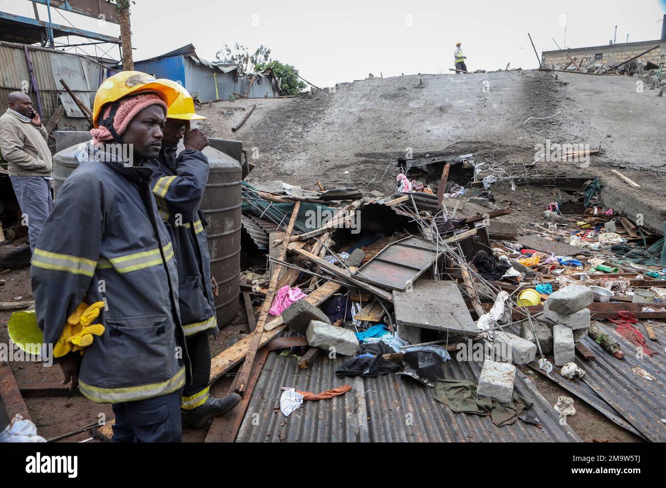 Rescuers attend the scene of a building collapse in Ruaka, on the ...