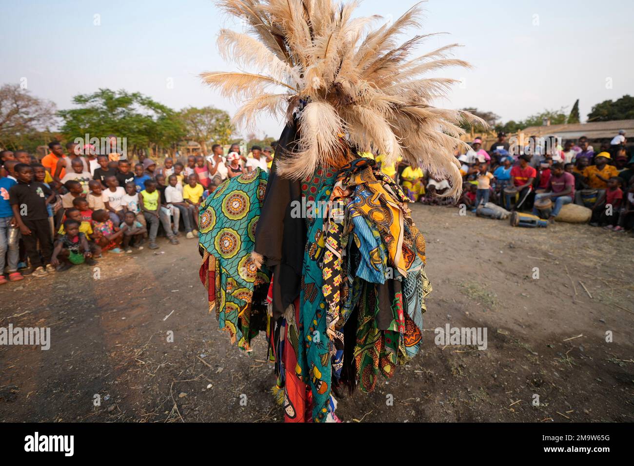 Gule Wamkulu dance secretive society members in gory masks and colorful ...