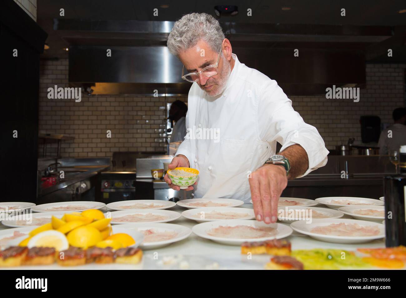 Chef Eyal Shani prepares a meal at HaSalon Miami's One-Year Anniversary ...