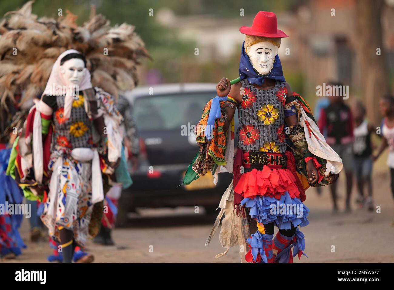 Gule Wamkulu dance secretive society members in gory masks and colorful ...