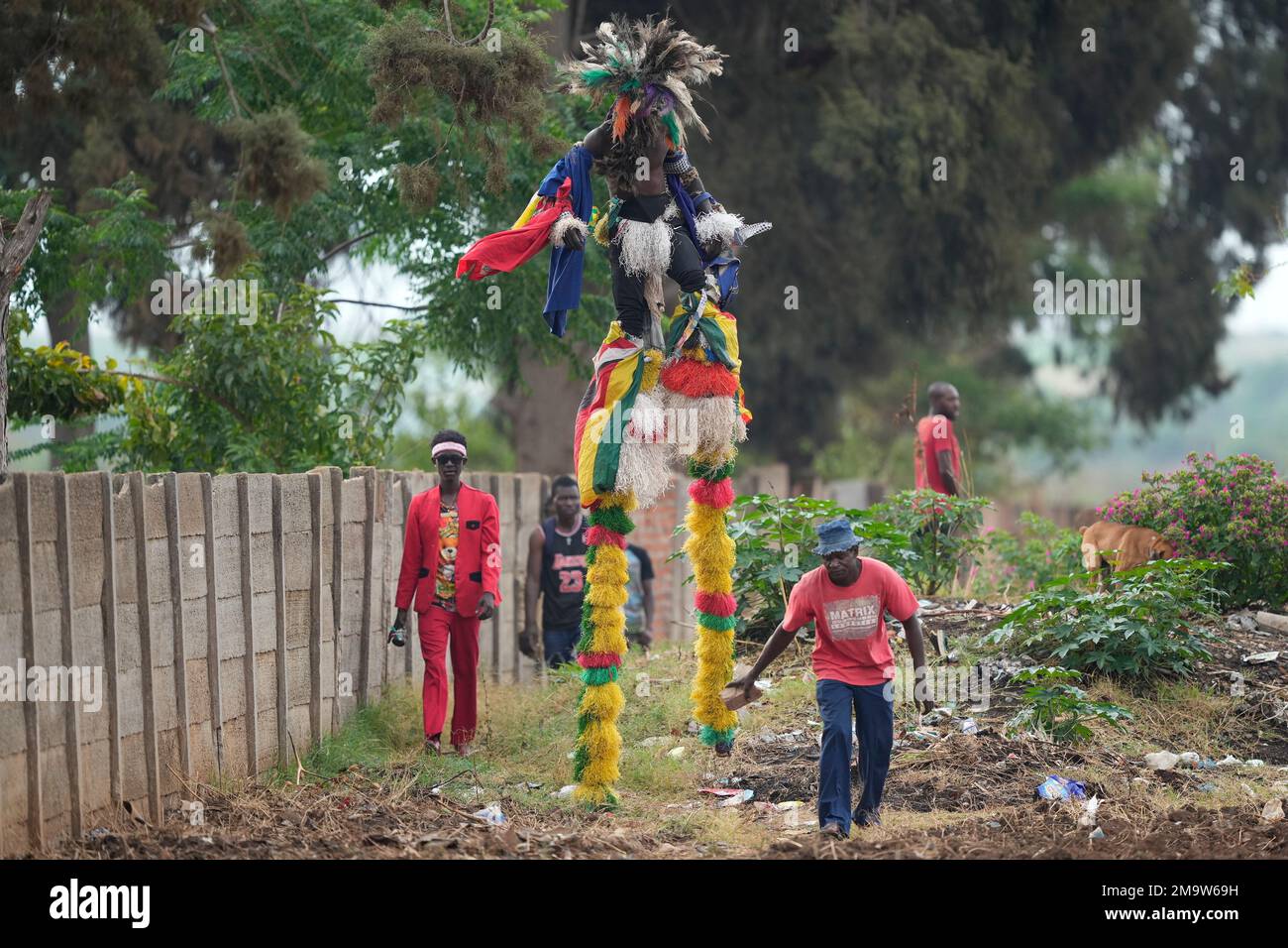 Gule Wamkulu dance secretive society members in gory masks and colorful ...