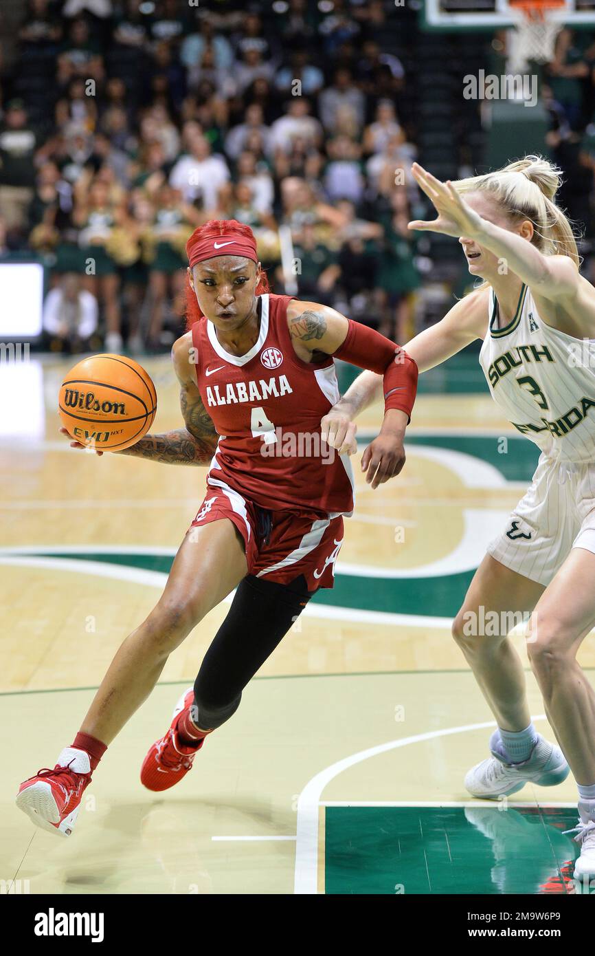 Alabama's JaMya Mingo-Young drives to the hoop in front of USF's Sammie ...