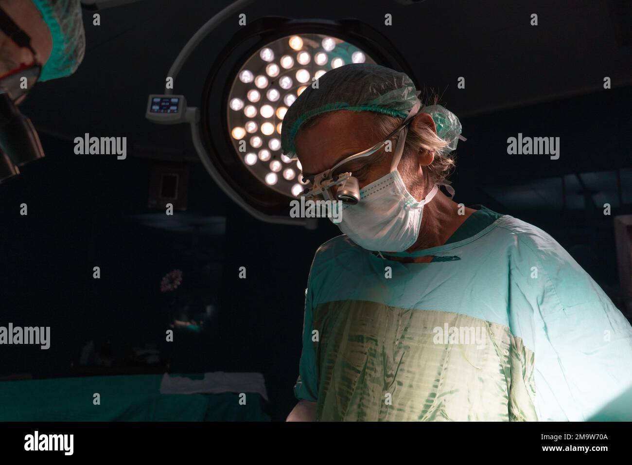 Open heart surgery doctor perform open heart surgery. Doctors in green ...