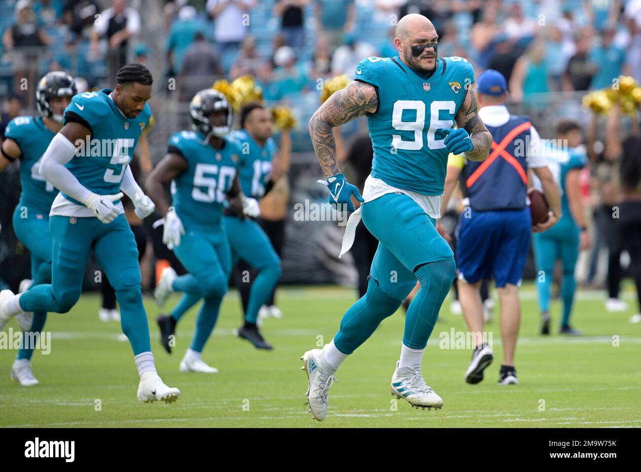 Jacksonville Jaguars defensive end Adam Gotsis (96) runs onto the field ...