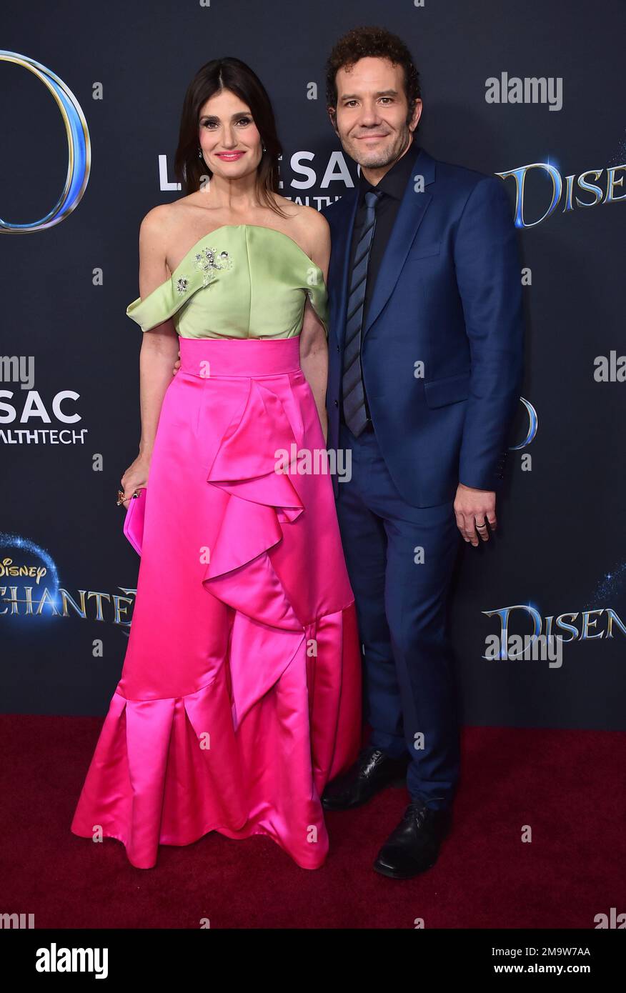 Idina Menzel, left, and Aaron Lohr arrive at the Los Angeles premiere ...