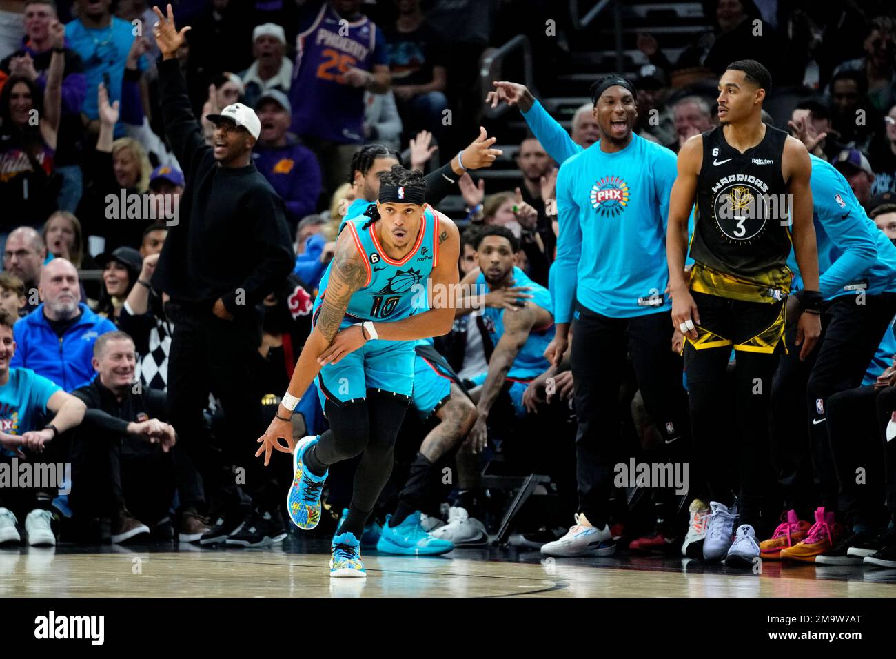 Phoenix Suns guard Damion Lee (10) gestures after making a three ...