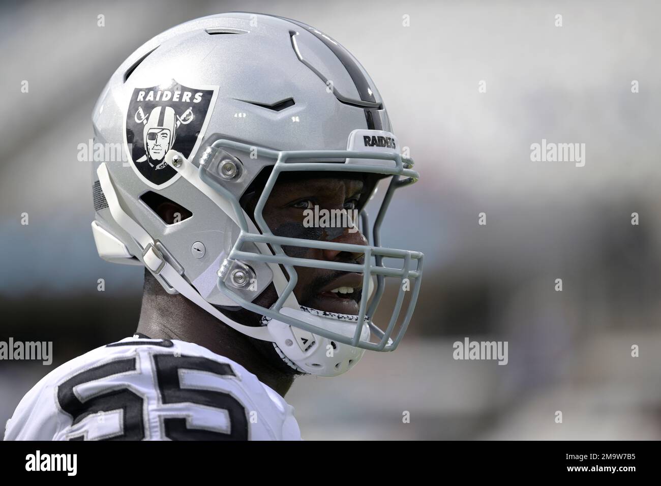Las Vegas Raiders defensive end Chandler Jones (55) warms up before an ...