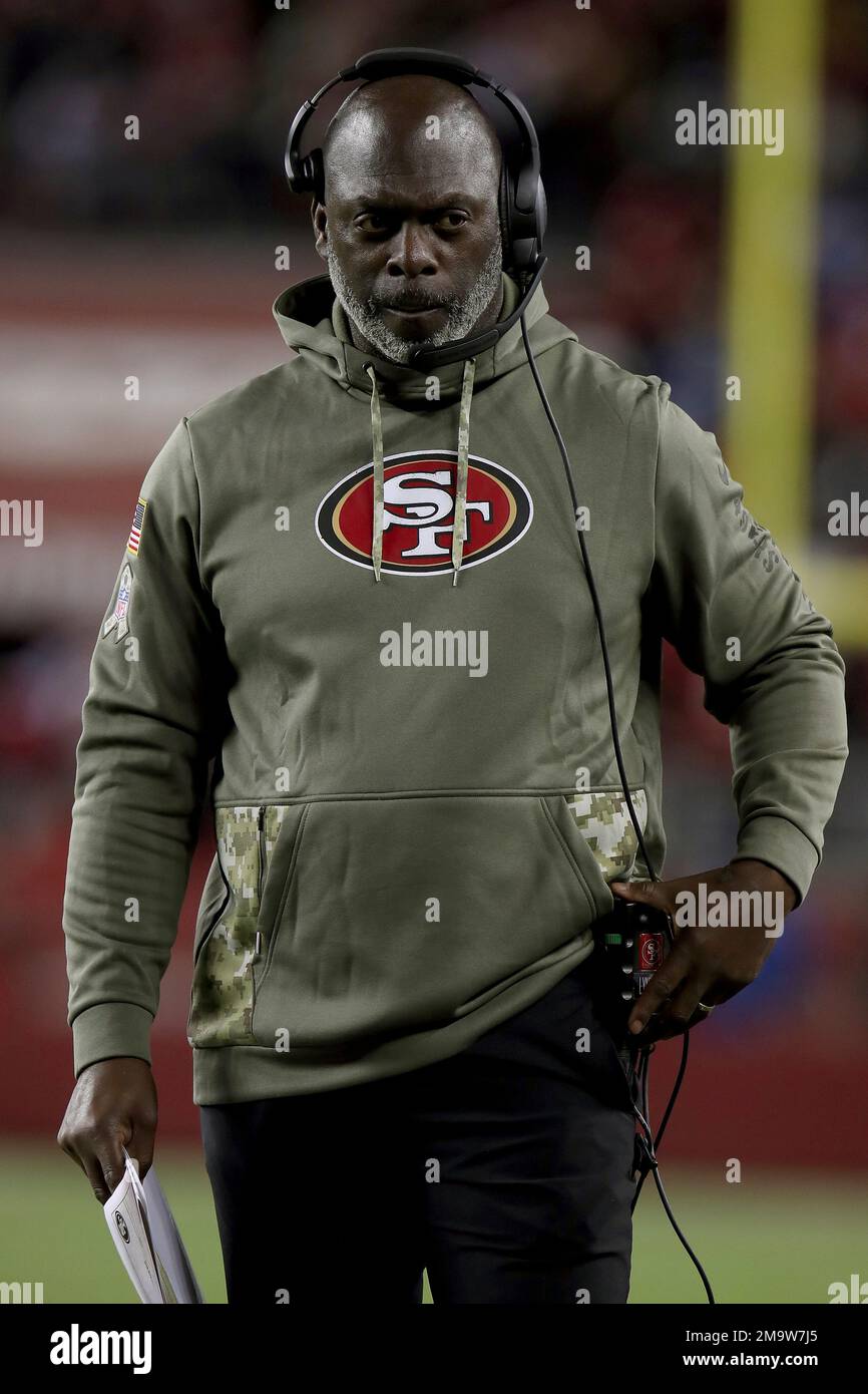 San Francisco 49ers assistant head coach Anthony Lynn walks on the ...