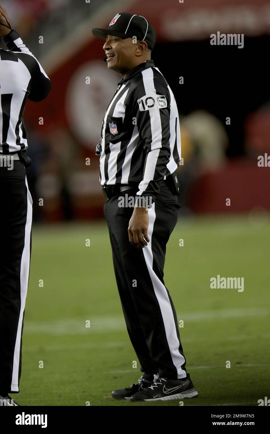 Down judge Patrick Holt (106) reacts during an NFL football game ...